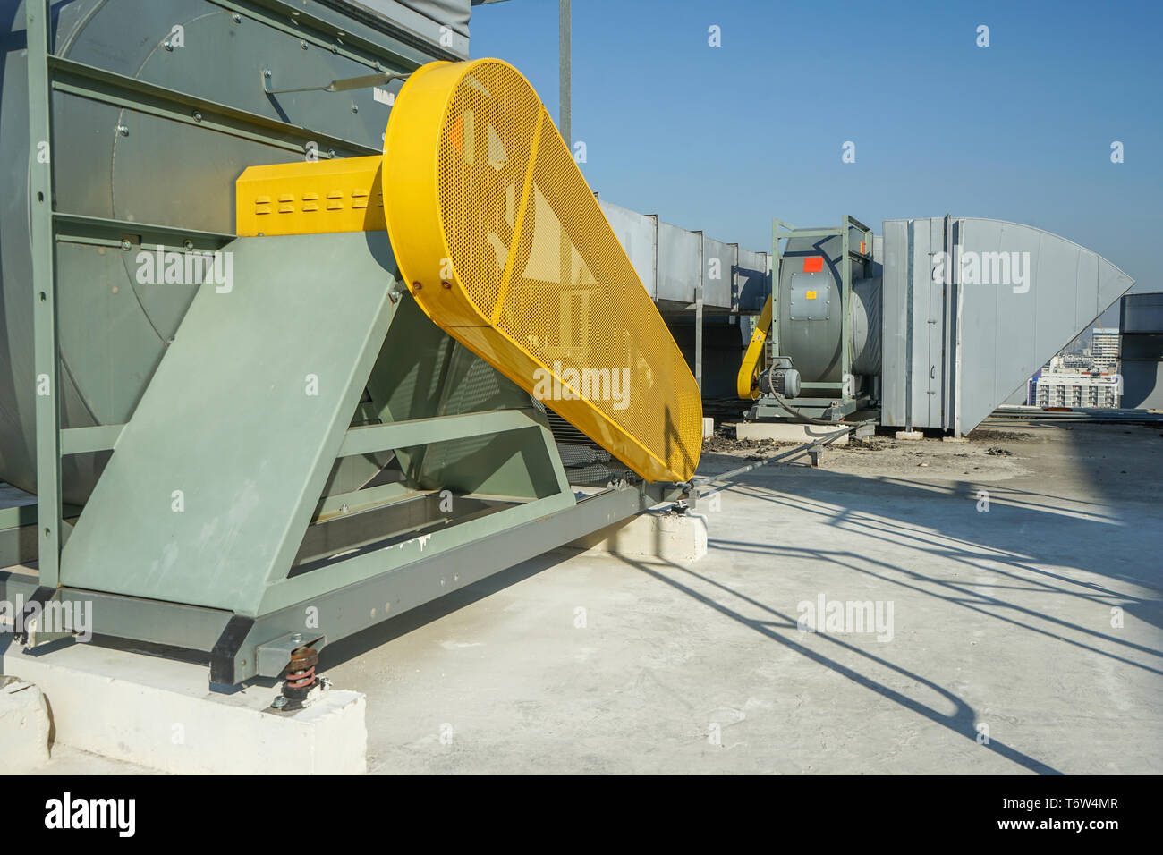big machine on the top of building Stock Photo - Alamy