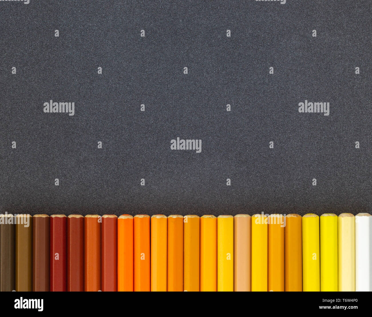 Line of colored pencils bottom side dark background top view Stock ...