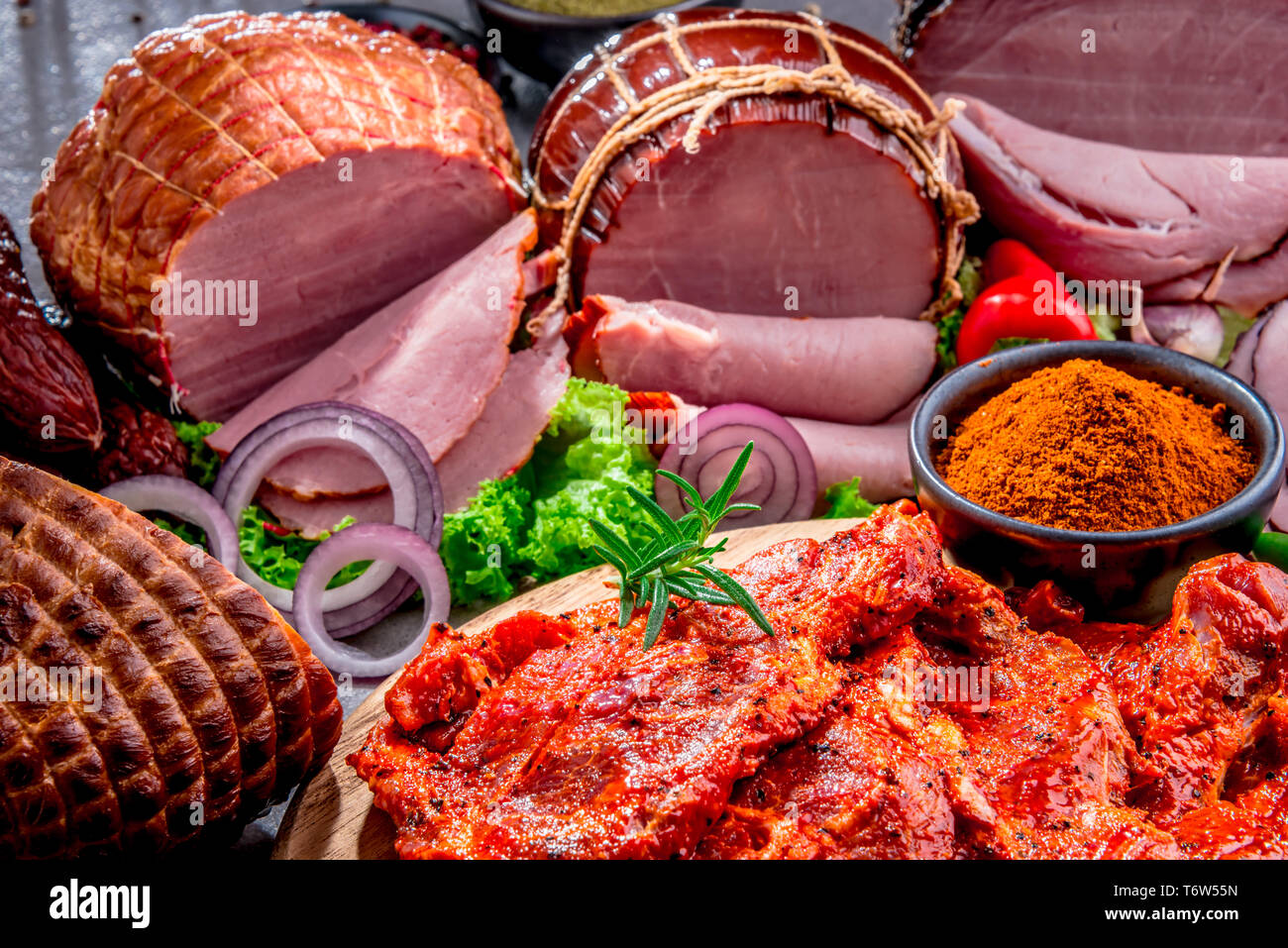 Composition with assorted meat products including ham Stock Photo - Alamy