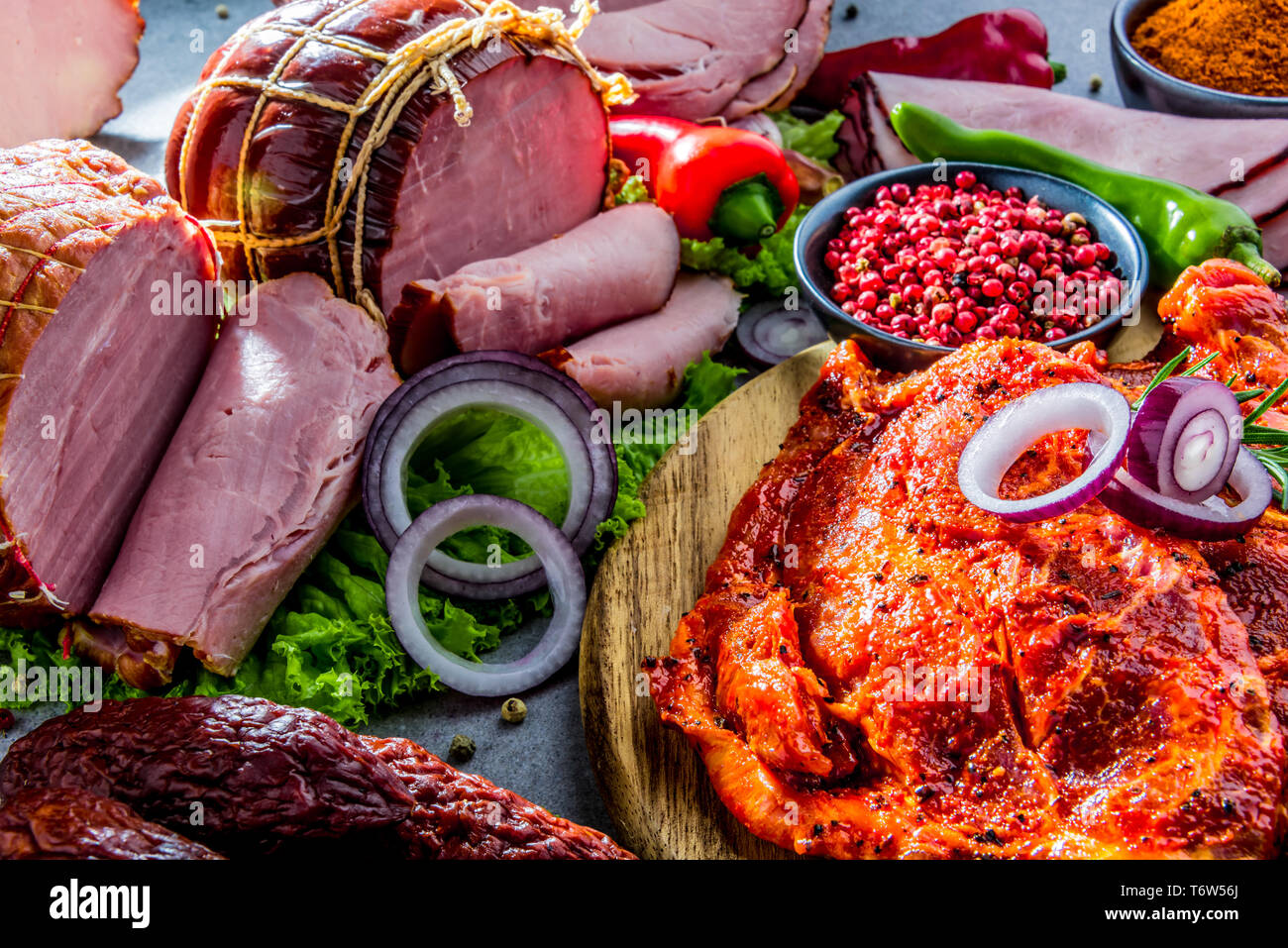 Composition with assorted meat products including ham Stock Photo - Alamy