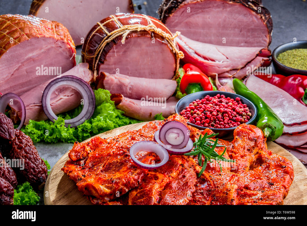 Composition with assorted meat products including ham Stock Photo - Alamy