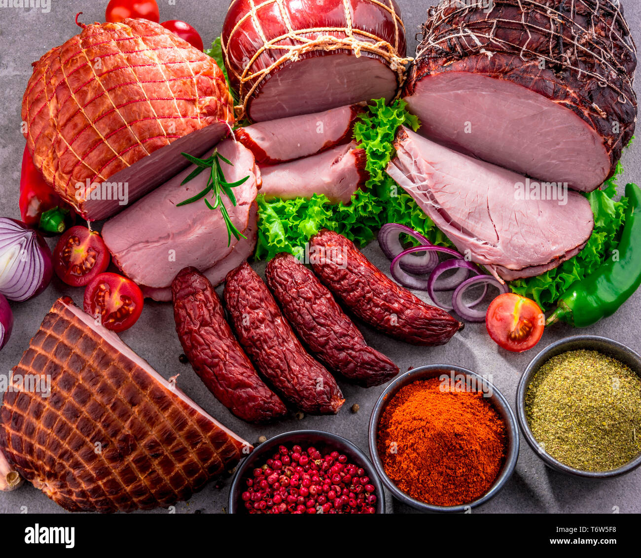 Composition with assorted meat products Stock Photo - Alamy