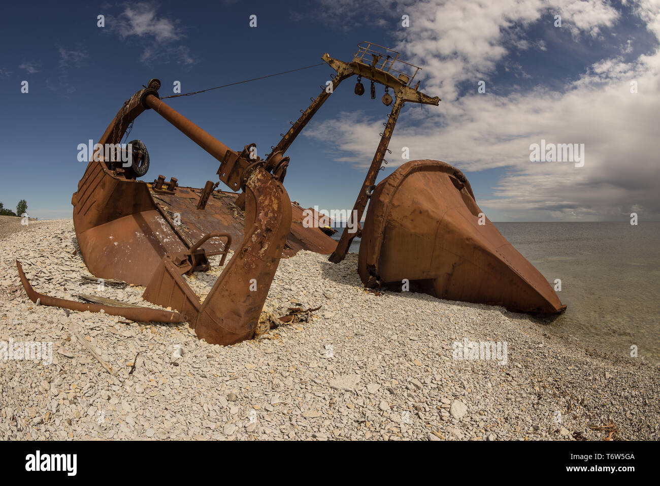 Old rusty wreck and rocky beach in Baltic Sea, natural environment ...