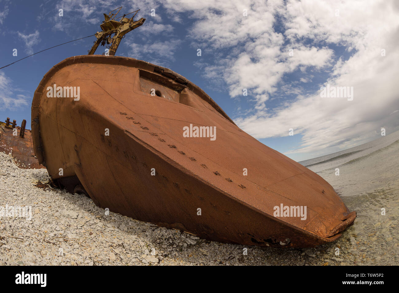 Old rusty wreck and rocky beach in Baltic Sea, natural environment ...