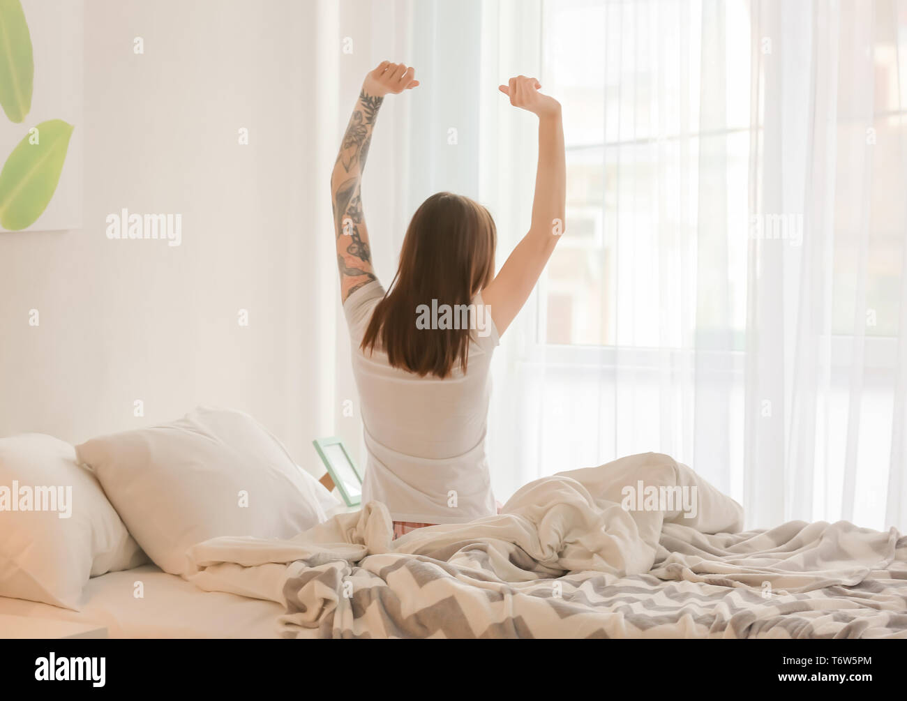 Young beautiful woman stretching on hi-res stock photography and images ...