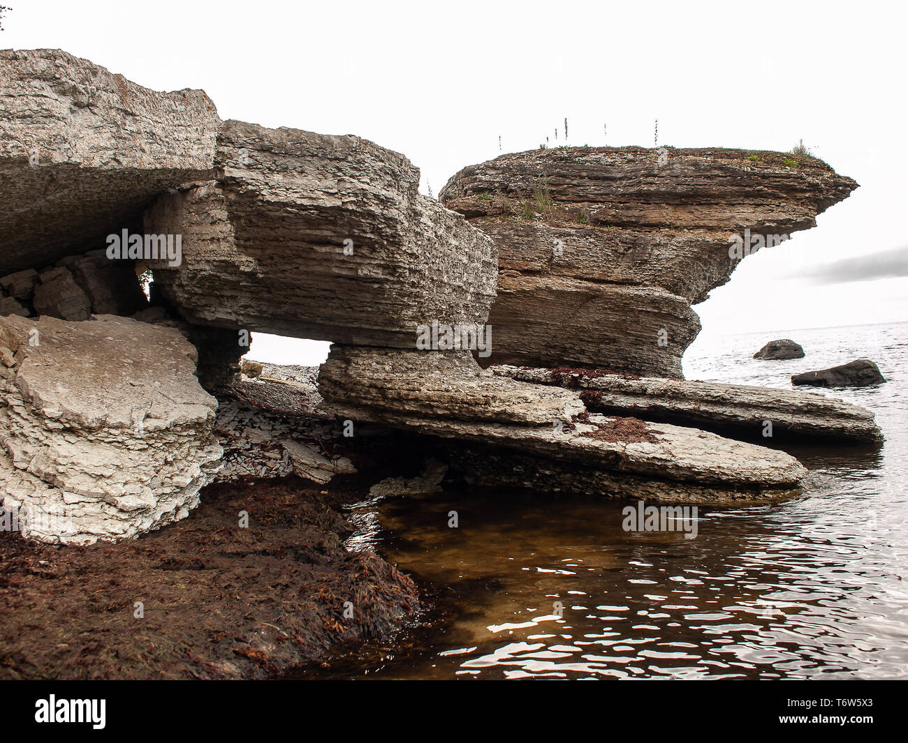 Stone wall on the Baltic sea in the summer. Pakri coast, island in ...