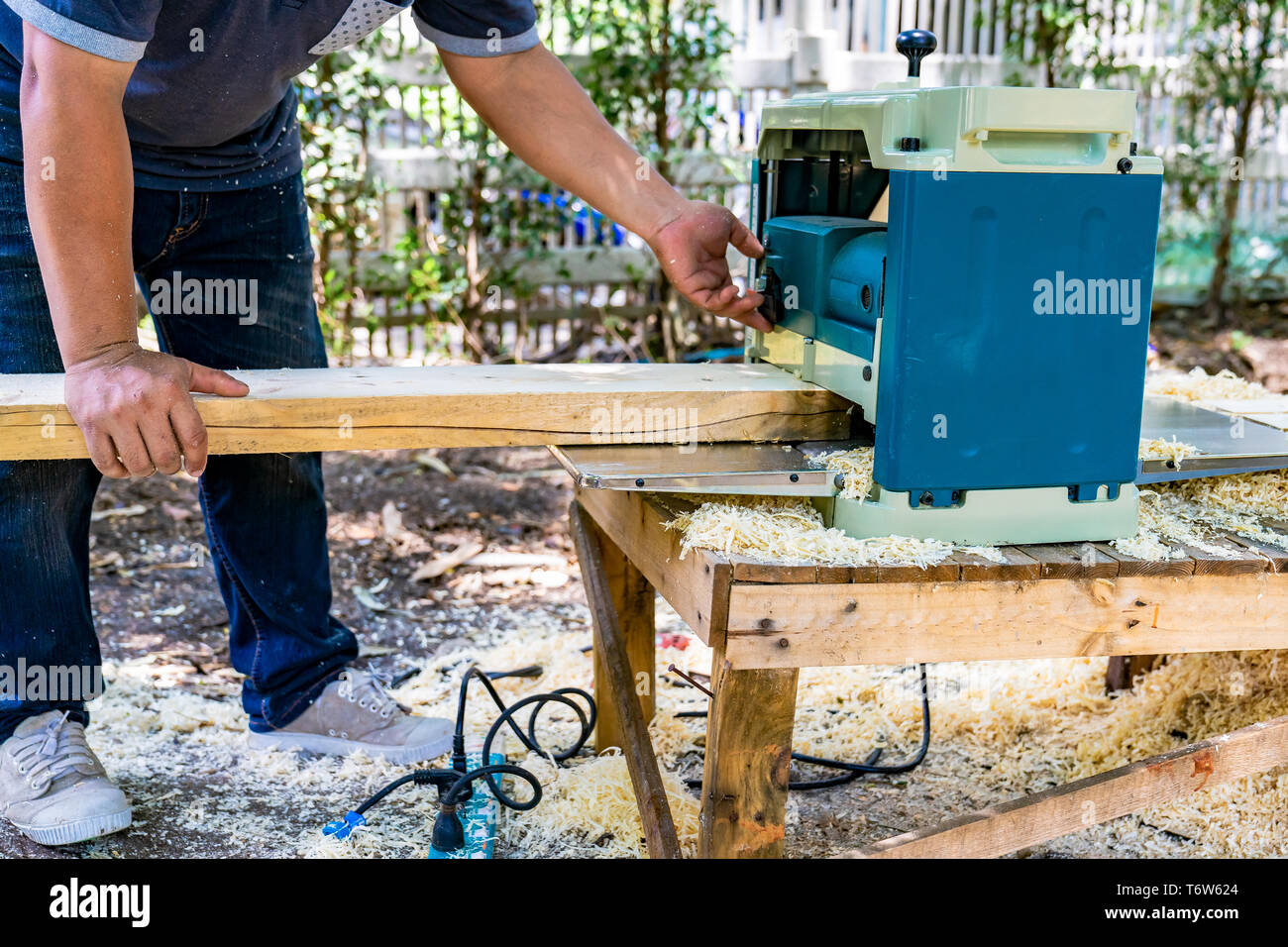 Carpenter polishing wood machine close hi-res stock photography and ...