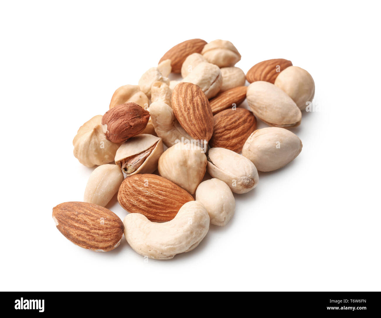 Different types of nuts on white background Stock Photo - Alamy