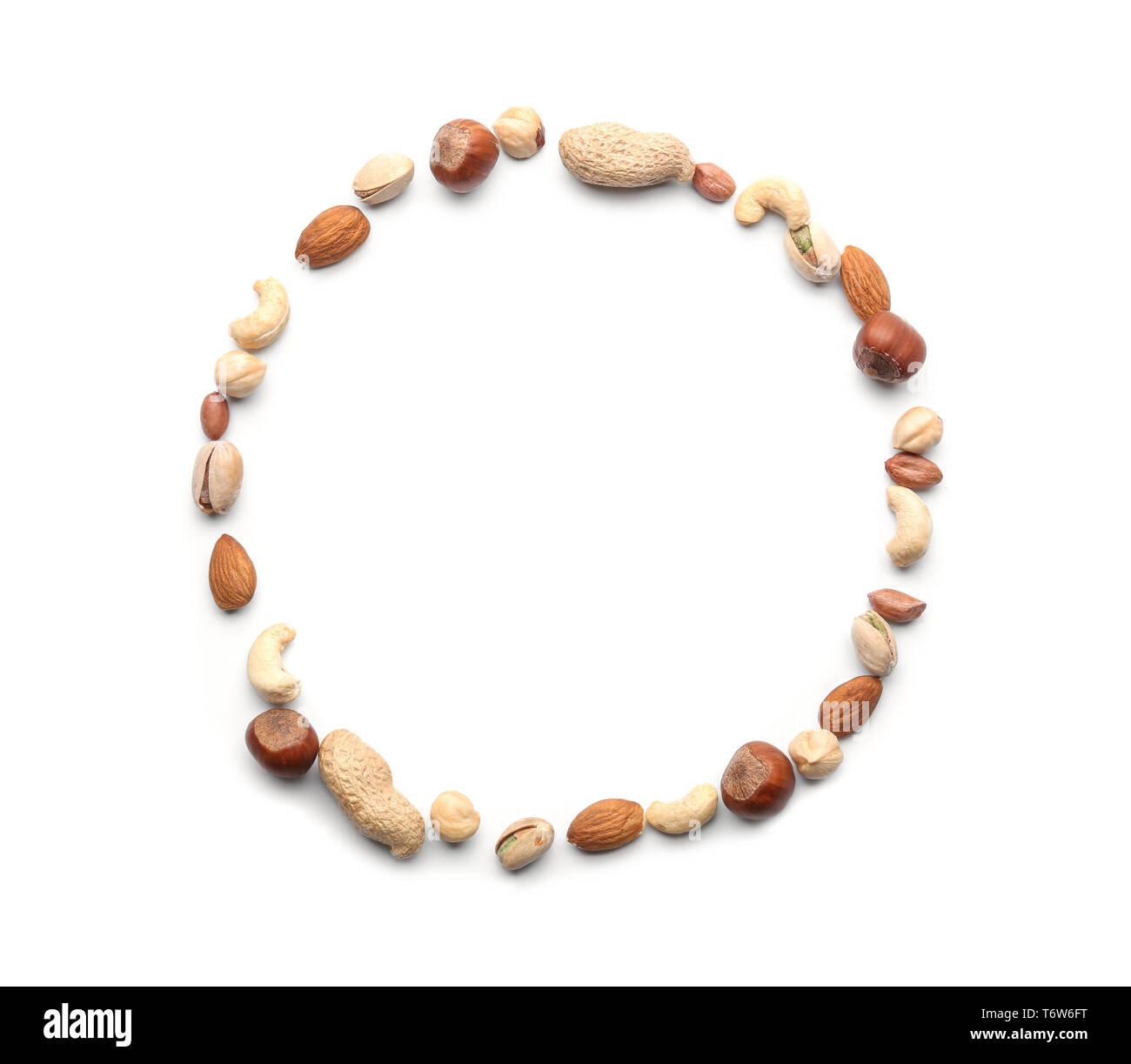Frame made of different types of nuts on white background Stock Photo ...
