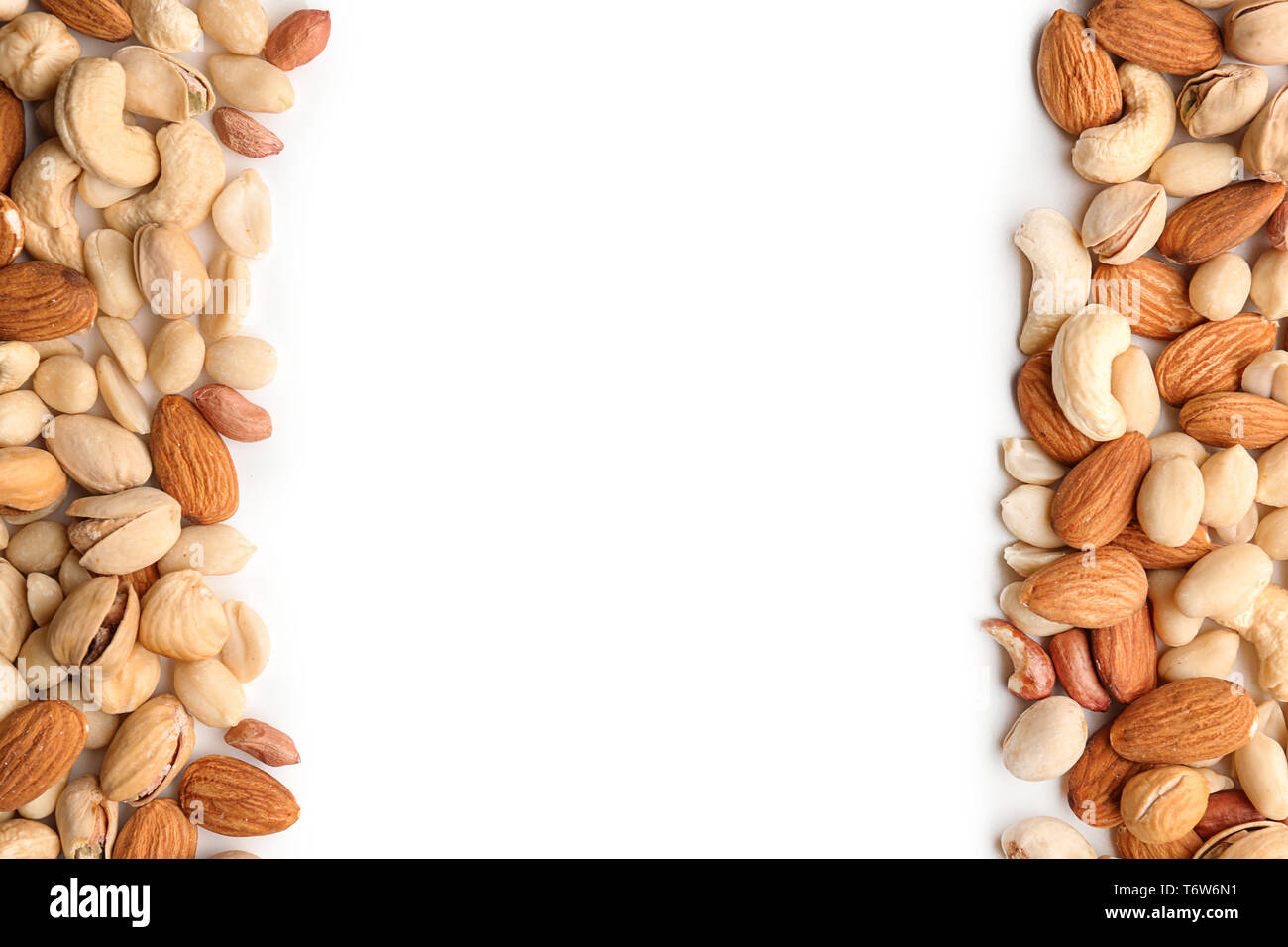 Different types of nuts on white background Stock Photo - Alamy