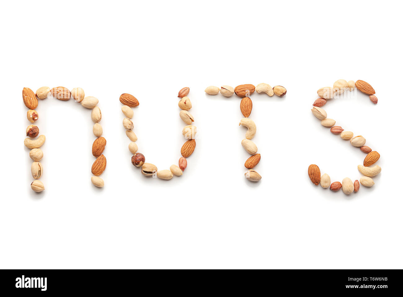 Word made of different types of nuts on white background Stock Photo ...
