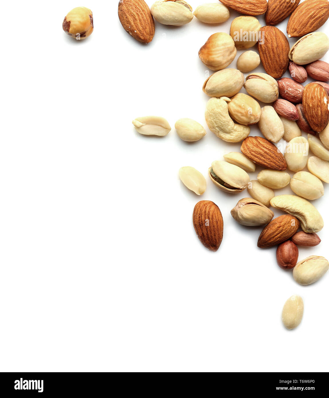 Different types of nuts on white background Stock Photo - Alamy