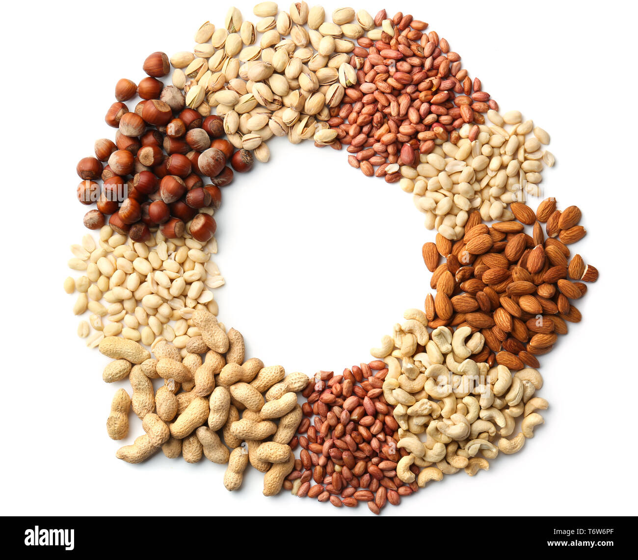 Frame made of different types of nuts on white background Stock Photo ...