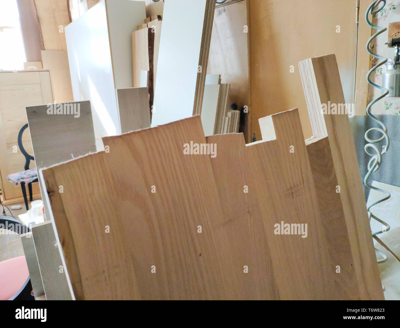 Cut wood pieces remaining from carpenter handcraft at furniture ...
