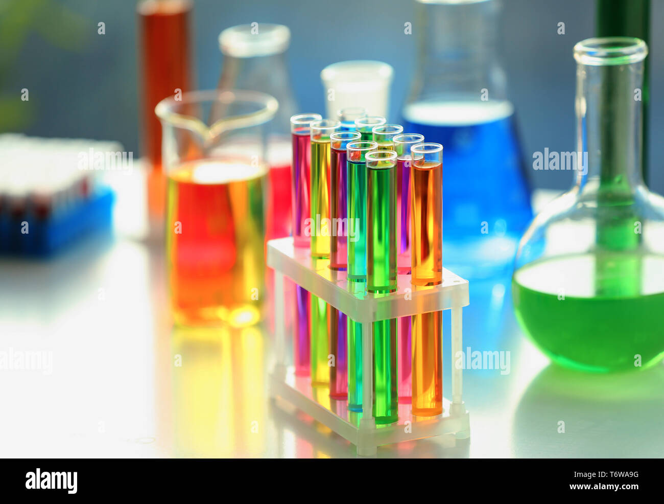 Test tubes with colorful samples in laboratory Stock Photo - Alamy