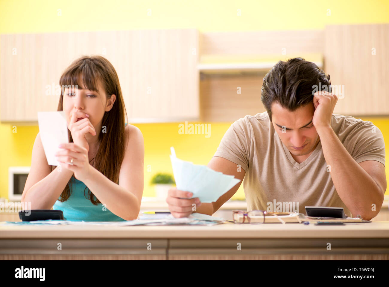 Young family struggling with personal finance Stock Photo - Alamy