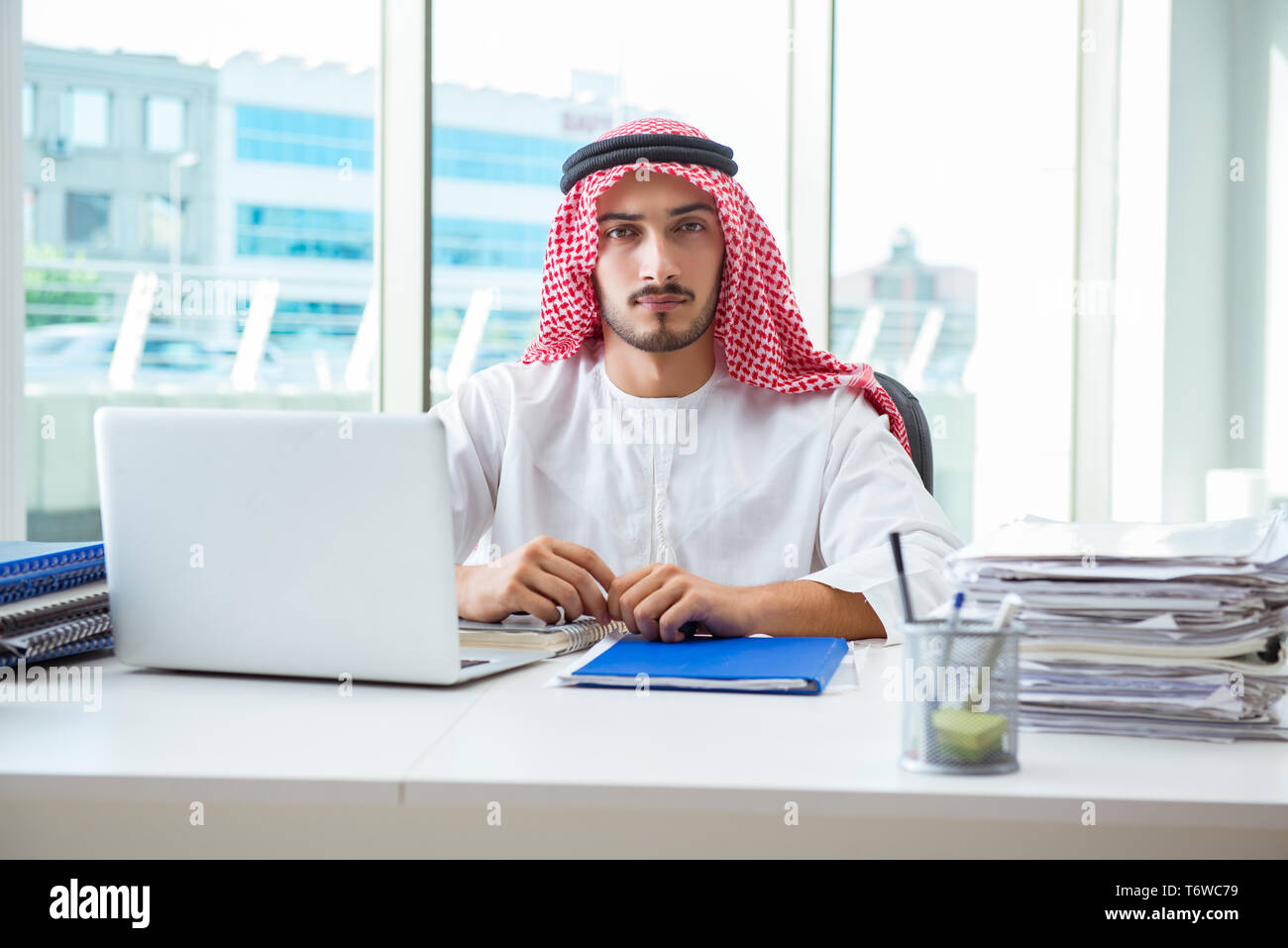 Arab businessman working in the office Stock Photo - Alamy