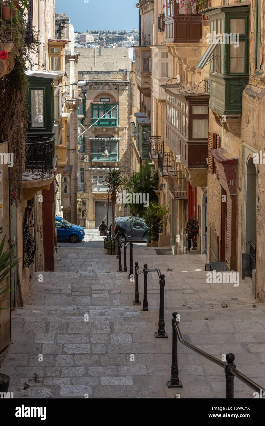 Traditional Maltese houses in Valletta with their vibrant, enclosed ...