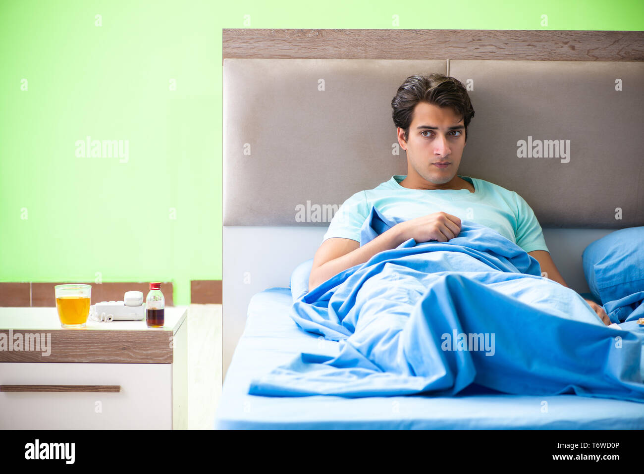 Man suffering from sleeping disorder and insomnia Stock Photo - Alamy