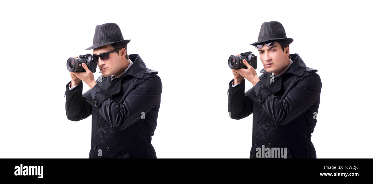 Spy with camera taking pictures isolated on white Stock Photo - Alamy