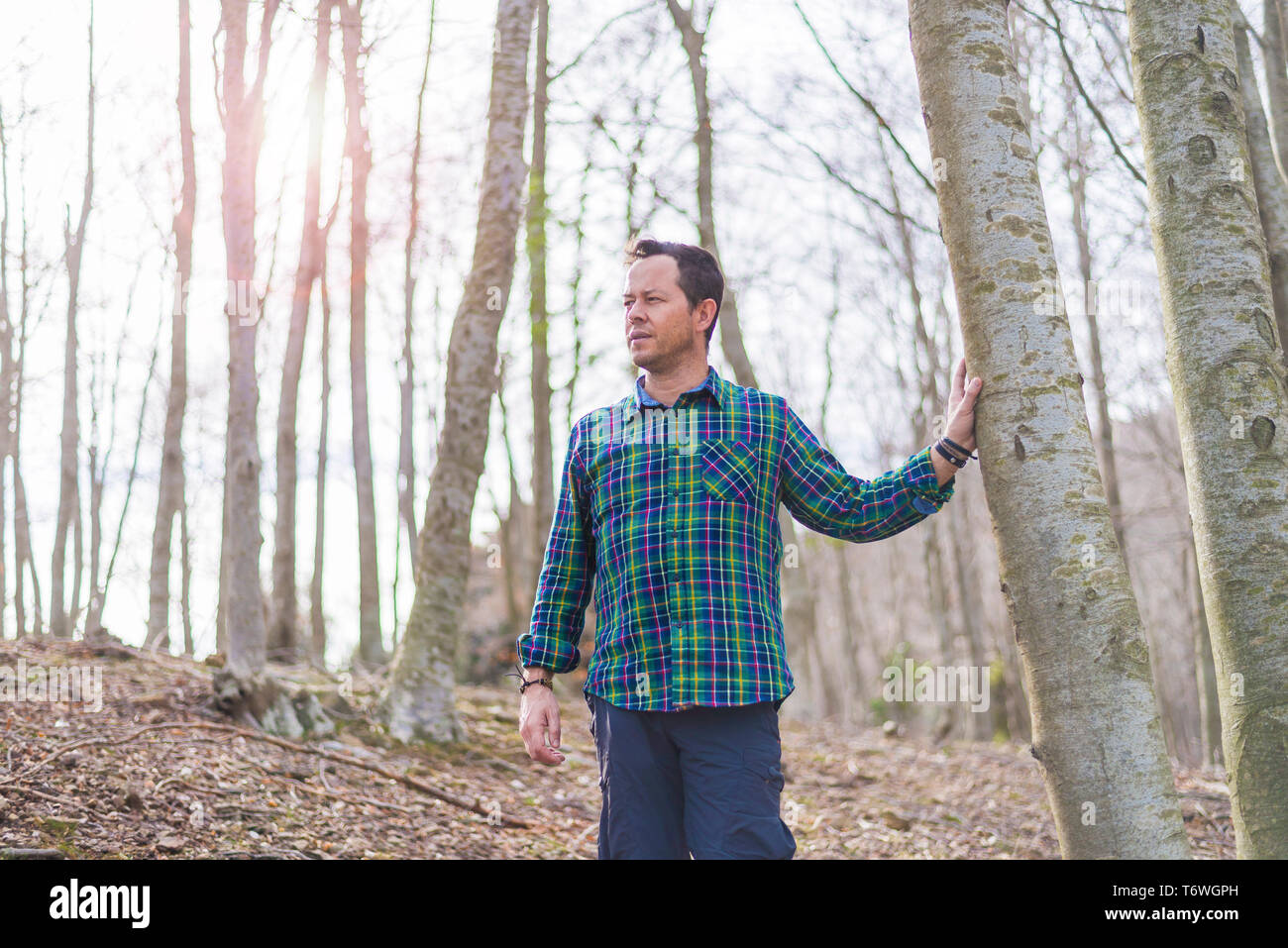 Man standing in forest hi-res stock photography and images - Alamy