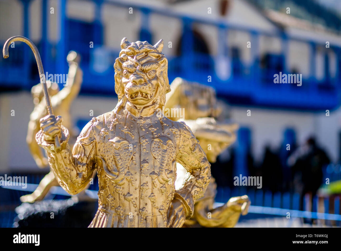 Golden statues in the Main Square featuring some of the characters of ...