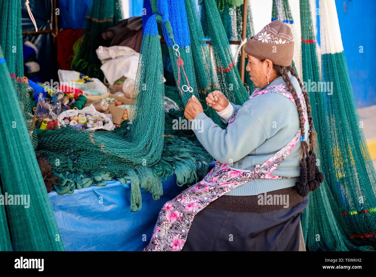 Rope and meshes seller on the streets of Paucartambo, Cusco Region ...