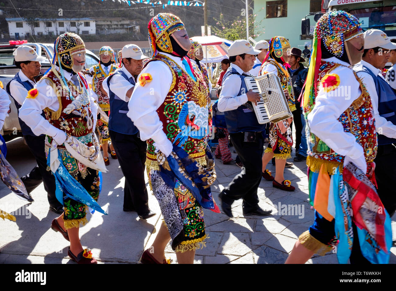 Masked and costumed characters on the parade of Festival of the Virgin ...