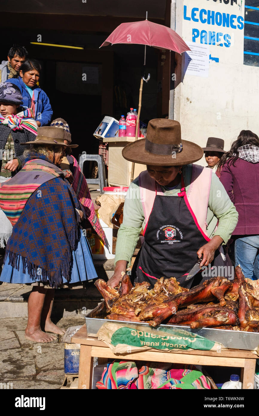 Food stand serving delicious local roast pork (or chancho) during the ...