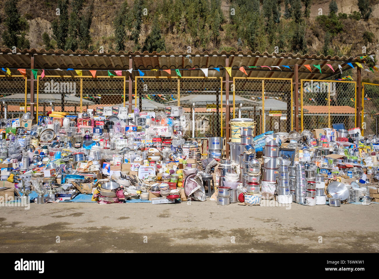 Cookware for sale on the street market during Festival of the Virgin of ...