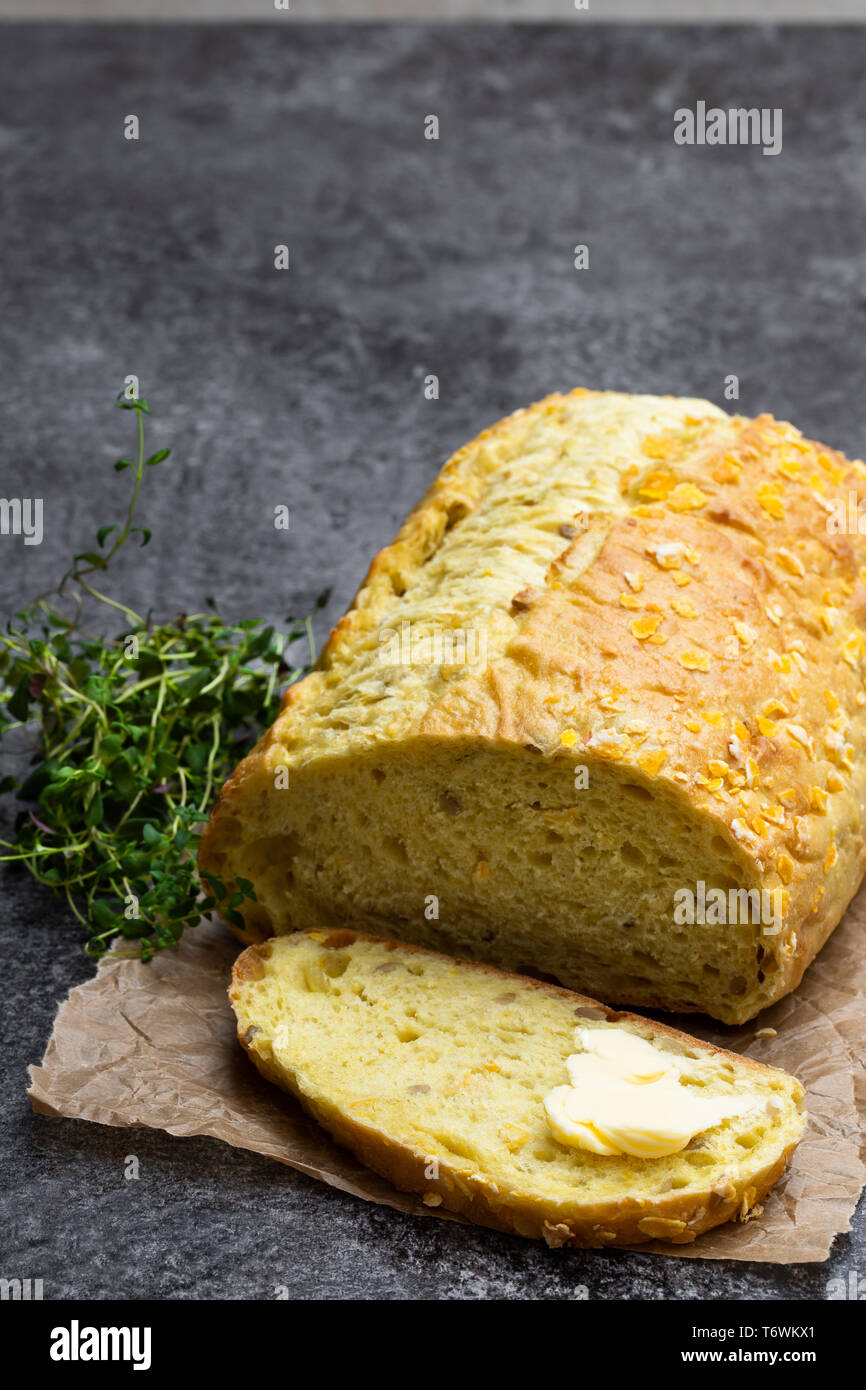 Homemade corn loaf on black stone background Stock Photo - Alamy
