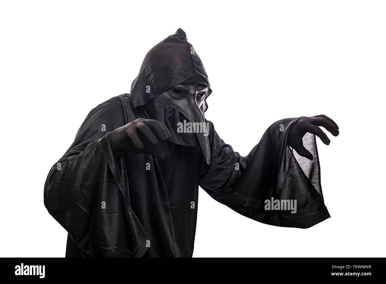Spooky monster in hooded cloak isolated on white background Stock Photo ...