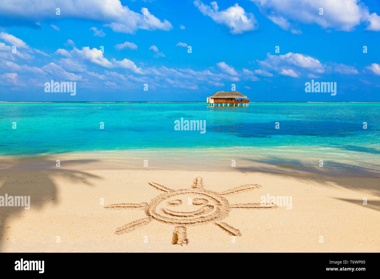 Drawing sun on beach Stock Photo - Alamy