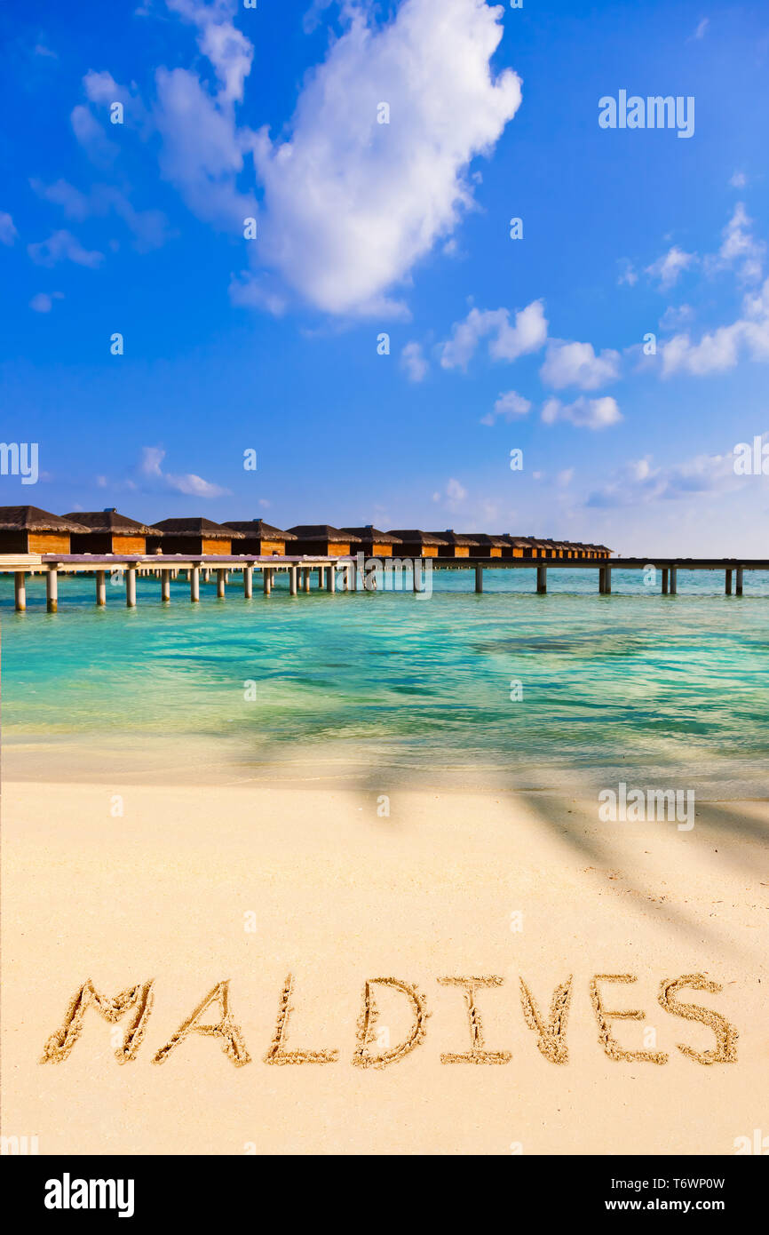 Word Maldives on beach Stock Photo - Alamy