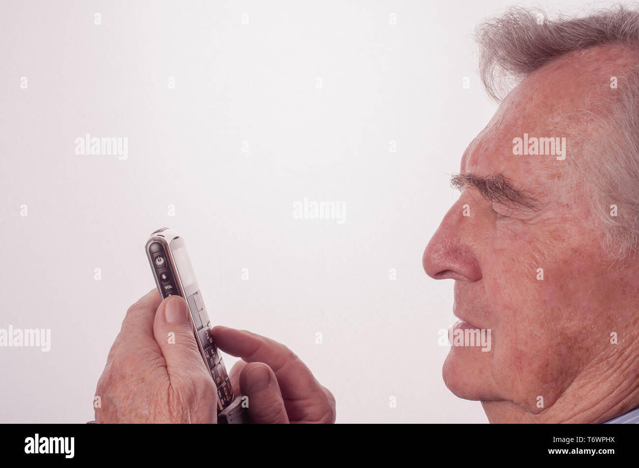 Old age eyesight mobile phone hi-res stock photography and images - Alamy