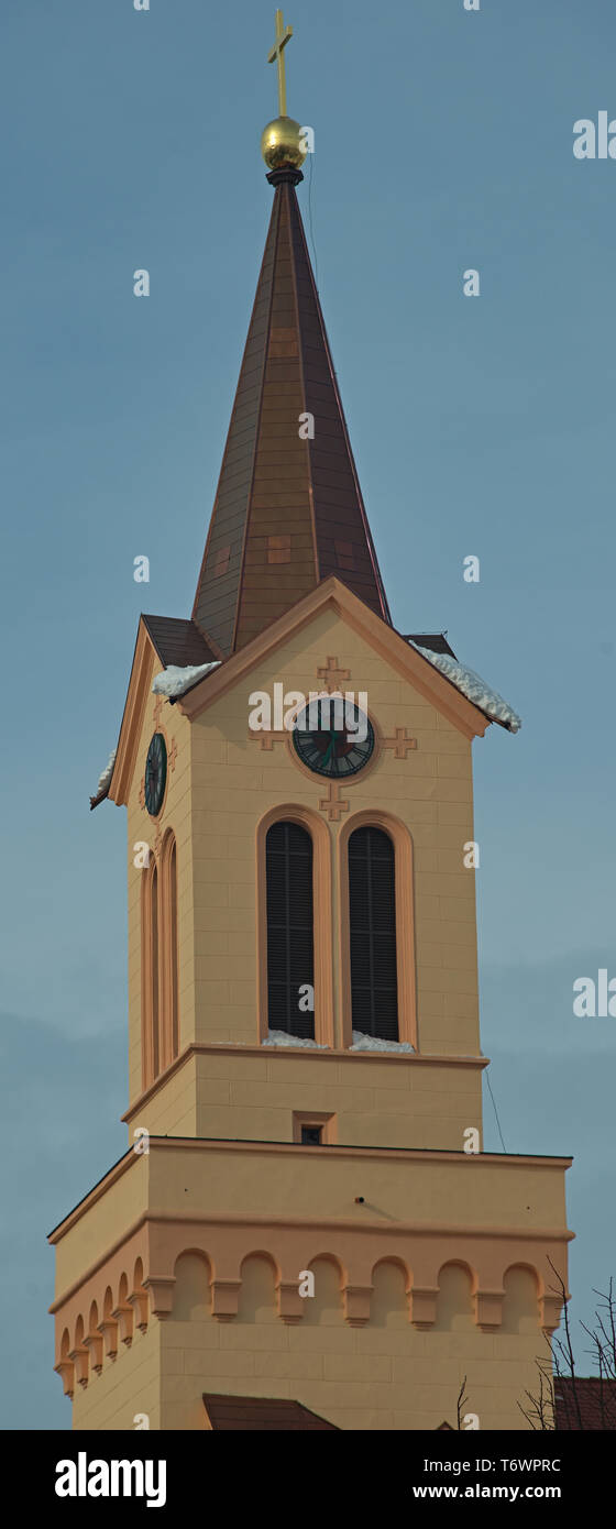 Fully reconstructed orange orthodox church bell tower Stock Photo - Alamy