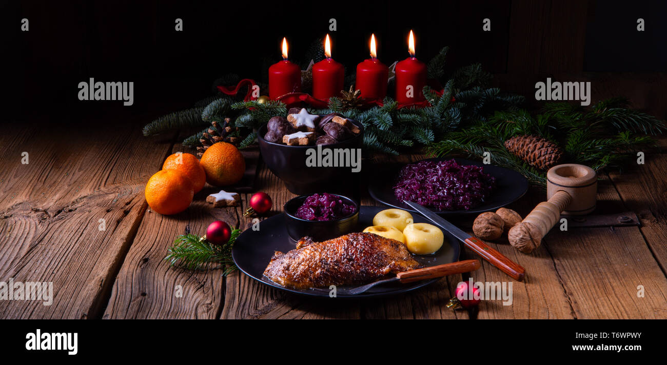 classic and crispy roasted duck with cabbage and dumplings Stock Photo ...