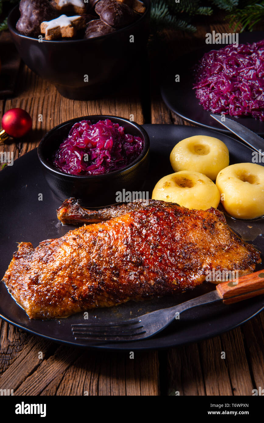 classic and crispy roasted duck with cabbage and dumplings Stock Photo ...