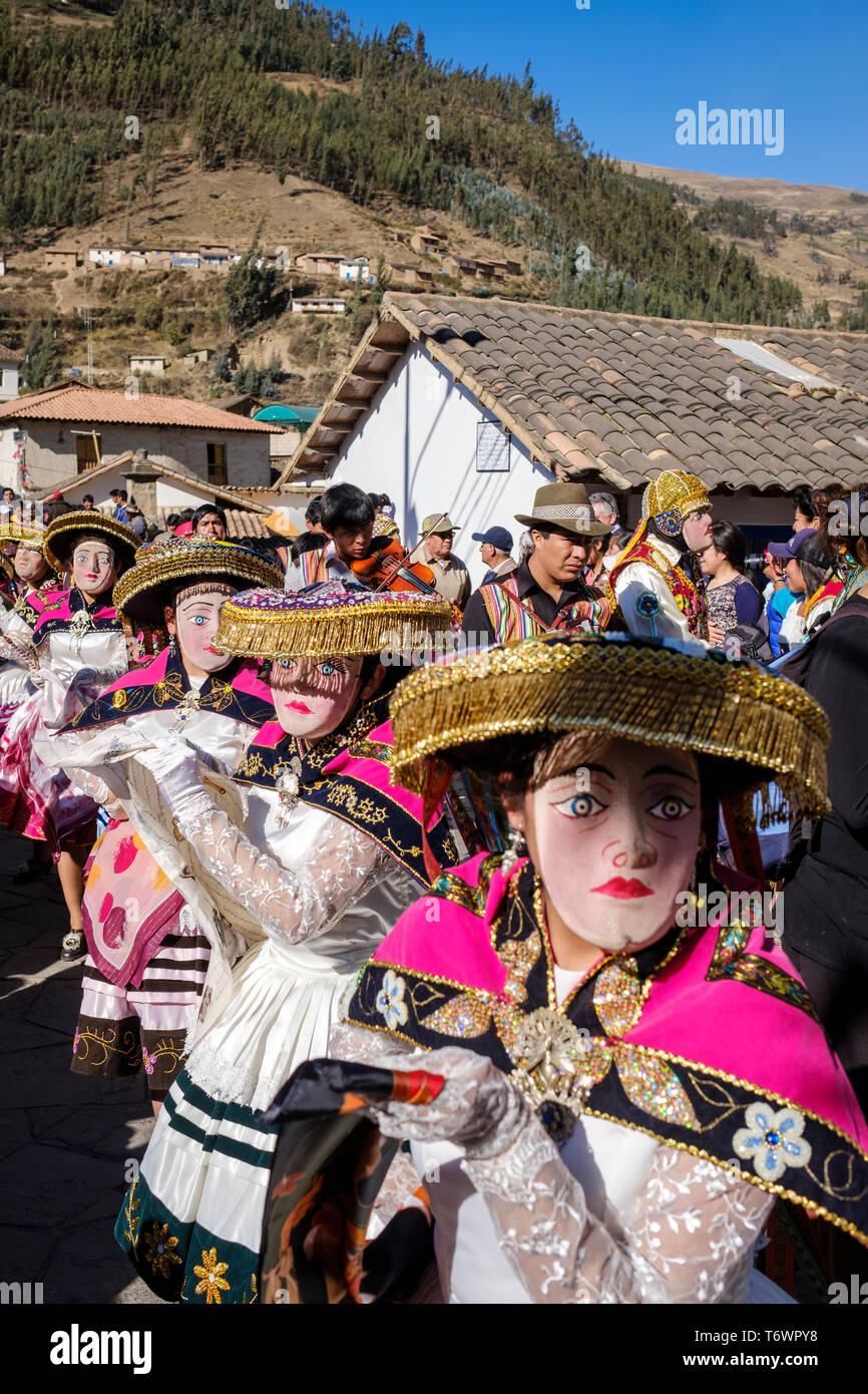 Masked and costumed characters on the parade of Festival of the Virgin ...