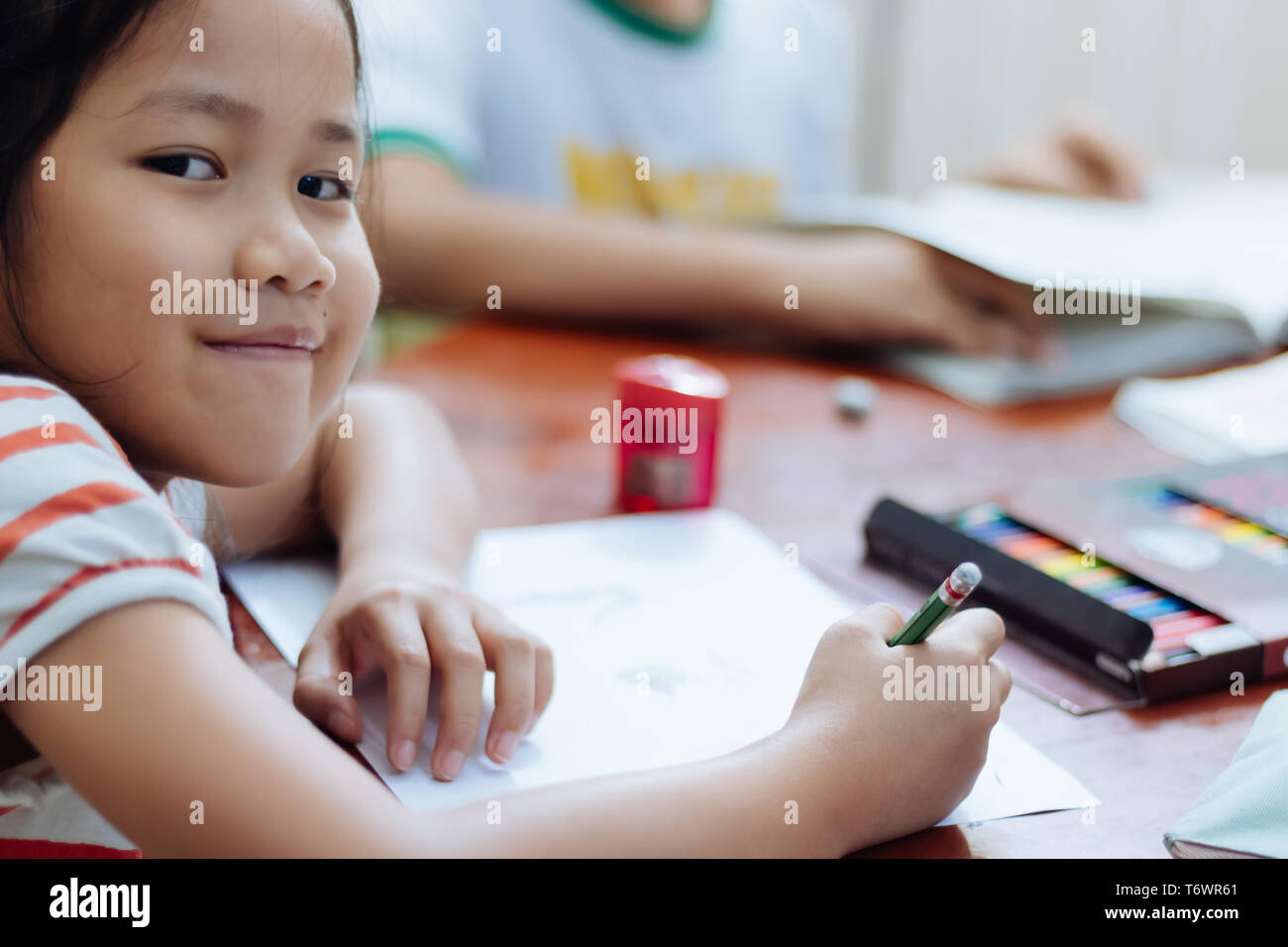 Student homework hi-res stock photography and images - Alamy