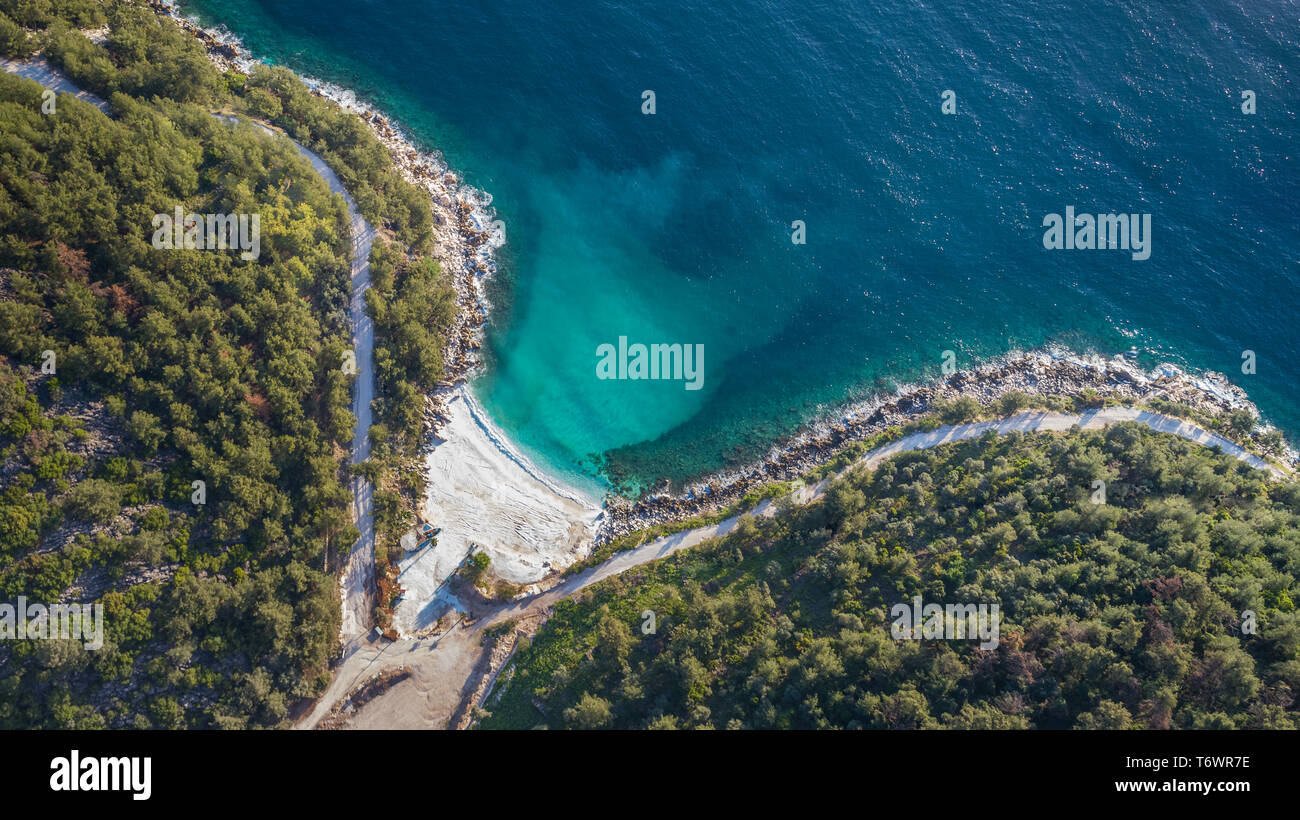 aerial view of Marble beach. The most beautiful white beach in Greece ...