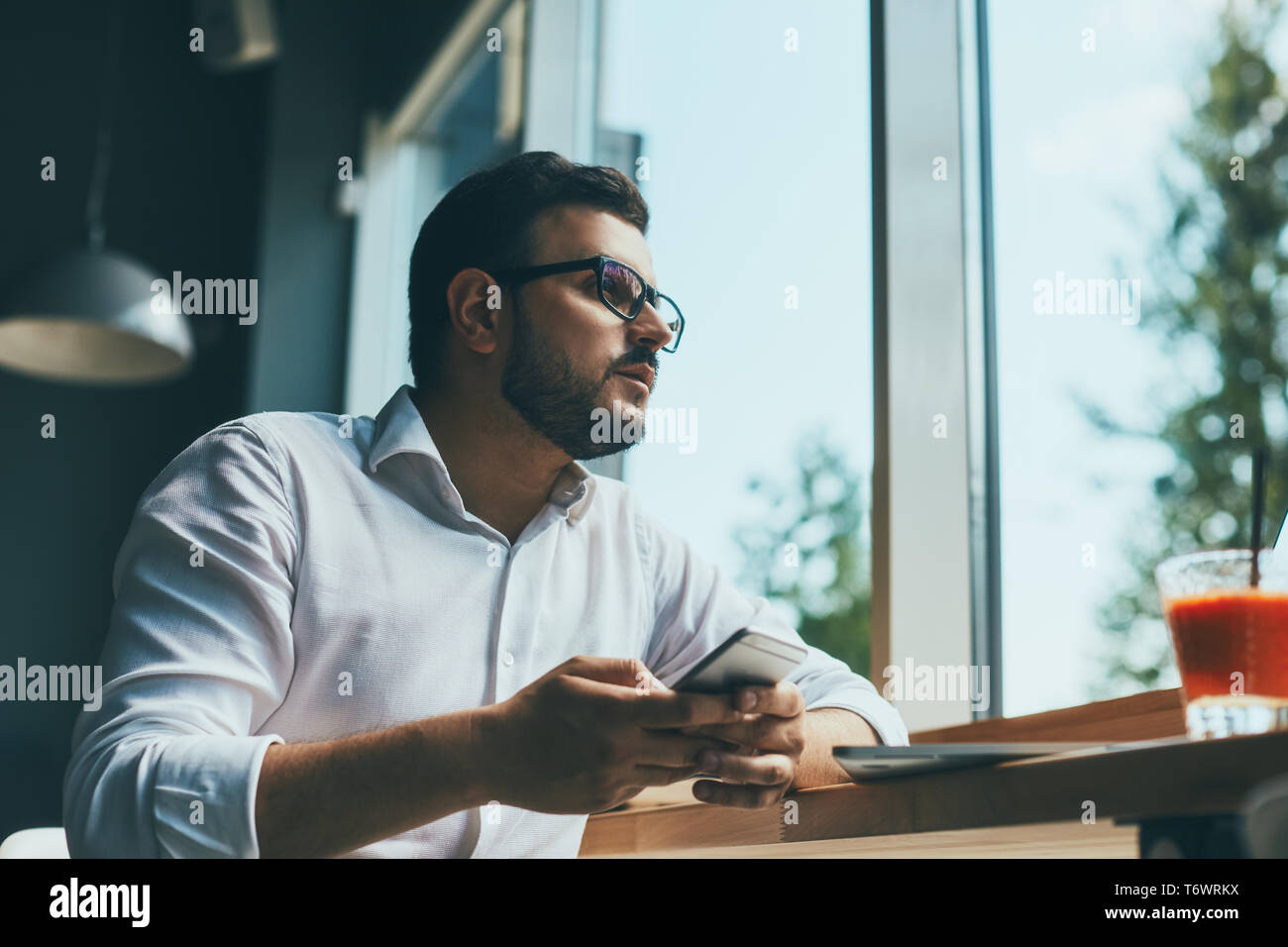 Working cafe teenage male hi-res stock photography and images - Alamy