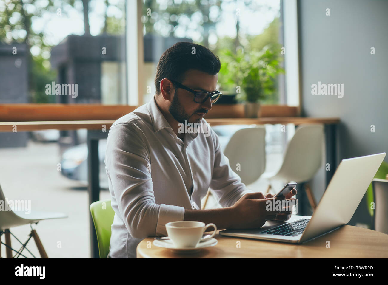 Working cafe teenage male hi-res stock photography and images - Alamy