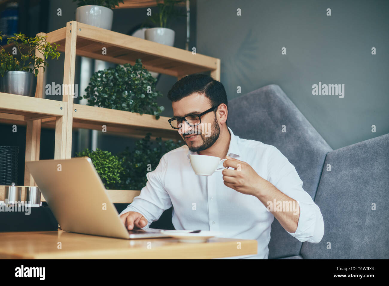 Working cafe teenage male hi-res stock photography and images - Alamy