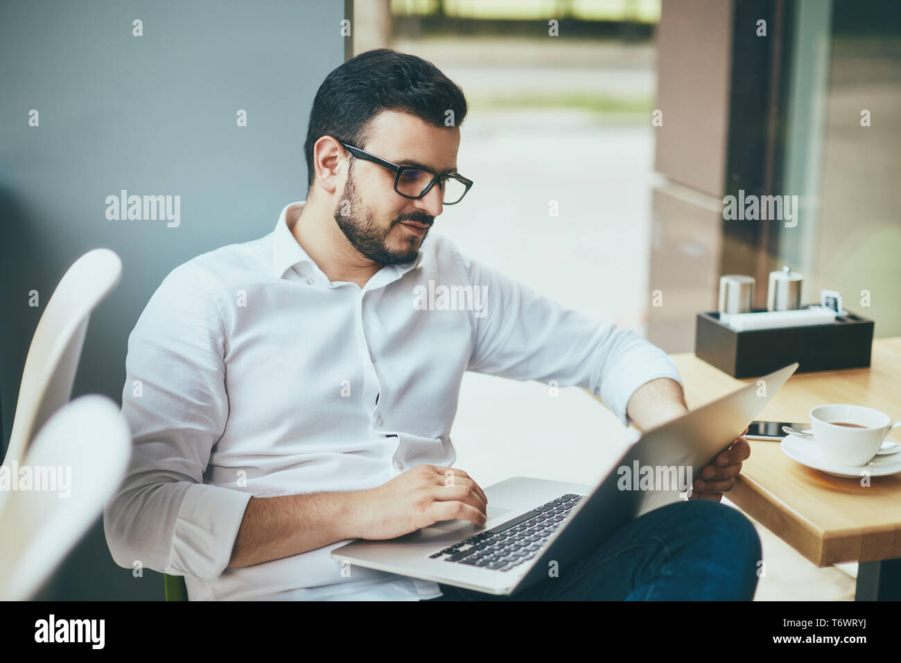 Working cafe teenage male hi-res stock photography and images - Alamy
