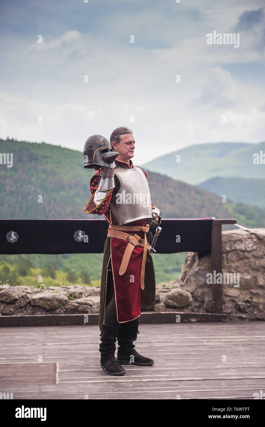 Knights demonstrating medieval weapons in Castle Boldogkovaralja ...