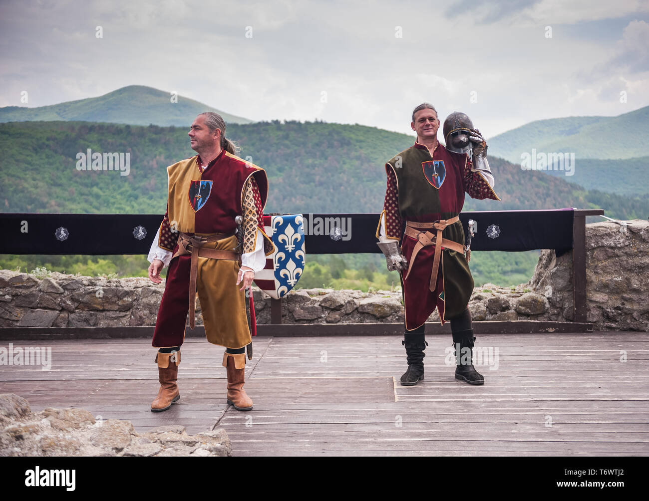 Knights demonstrating medieval weapons in Castle Boldogkovaralja ...