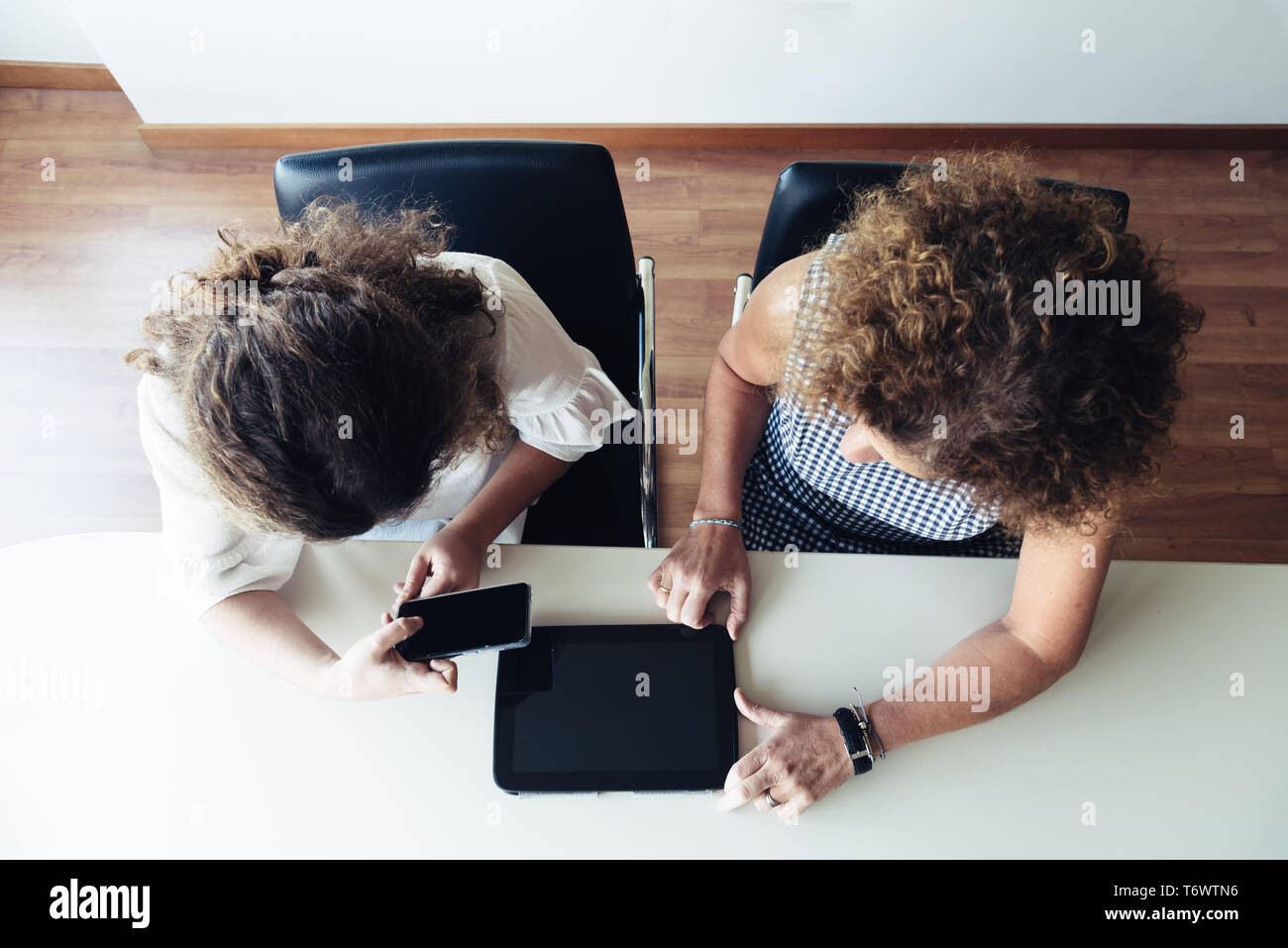 Business working together top view hi-res stock photography and images ...