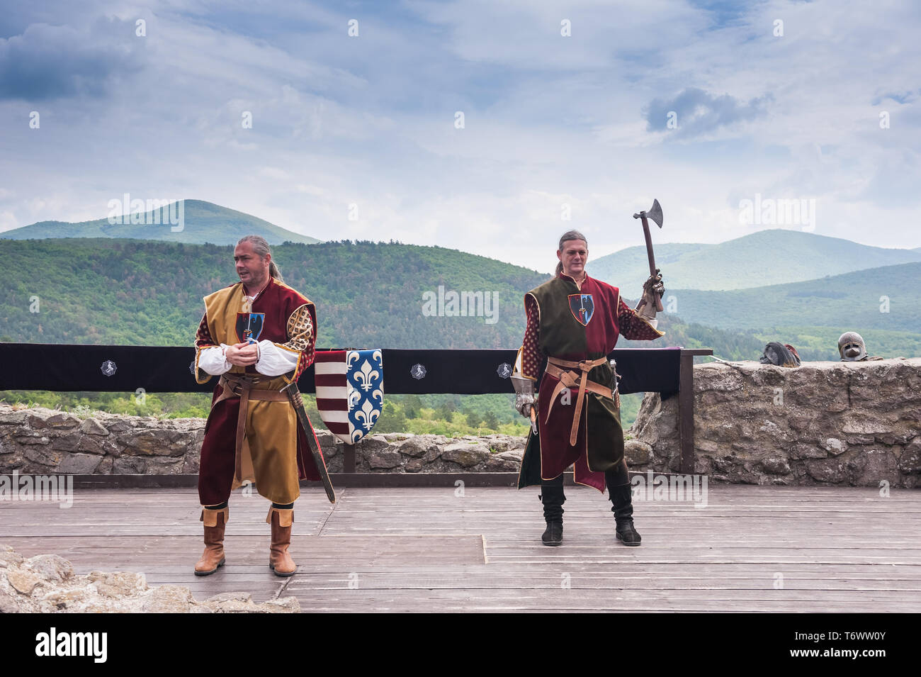 Knights demonstrating medieval weapons in Castle Boldogkovaralja ...
