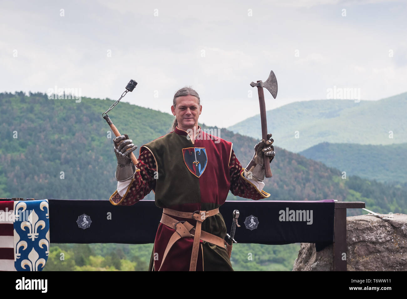 Knights demonstrating medieval weapons in Castle Boldogkovaralja ...